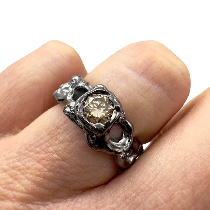 18 kt Black Gold Dentini Ring with central brown diamond and white sma ...